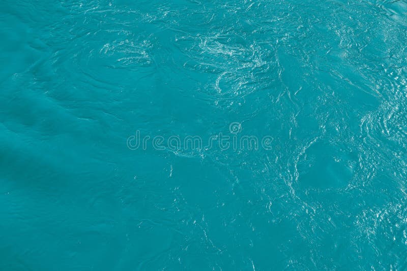 The Texture of the Waves of Blue Color of Fast-flowing Water in the ...