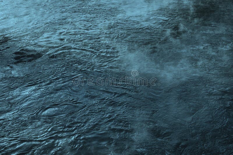 The Texture of the Waves of Blue Color of Fast-flowing Water in the ...