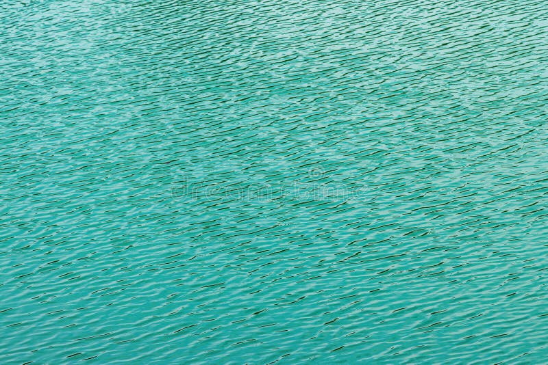 The Texture of the Waves of Turquoise Color of Fast-flowing Water in ...