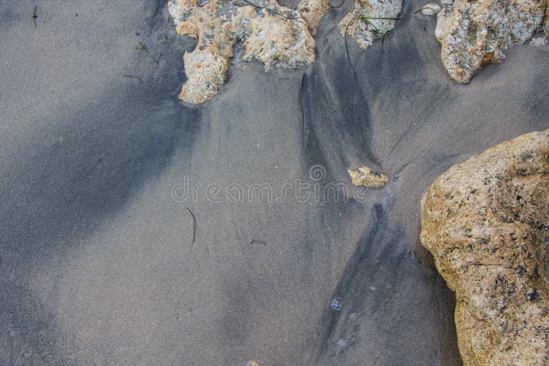 Wet Rock and Sand on the Beach. Stock Image - Image of landscape, rock ...