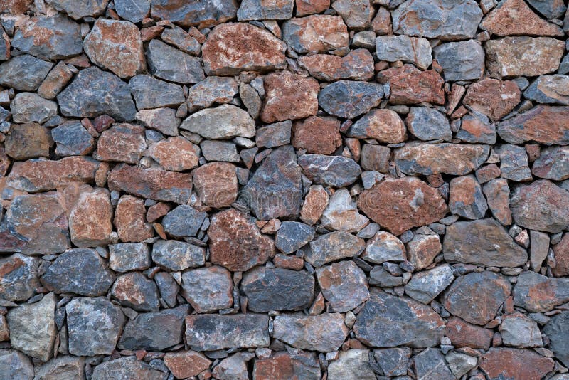Textured Background of Masonry Wall Made of Stones. Stock Photo - Image ...