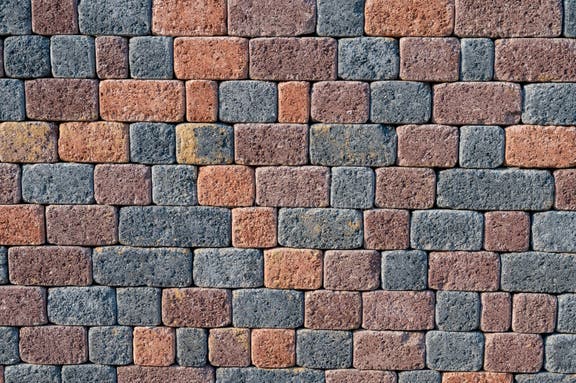 Textured Background of Multi-colored Stone Paver Bricks Wall Stock ...