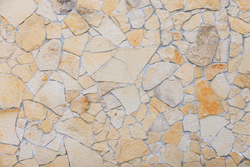 Textured Beige Stone Wall with Various Rock Patterns Stock Image ...