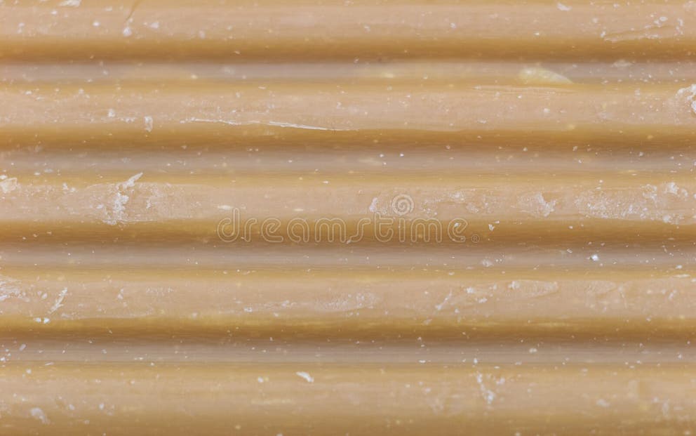 Textured Beige Surface with Horizontal Ridges and Subtle Specks Stock ...