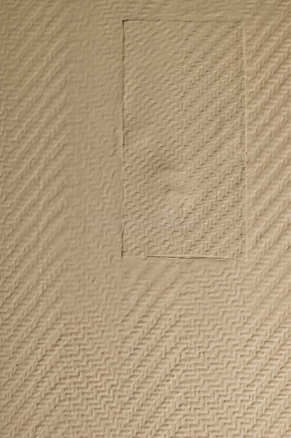 Textured Beige Wall with Rectangular Patch Stock Photo - Image of rough ...