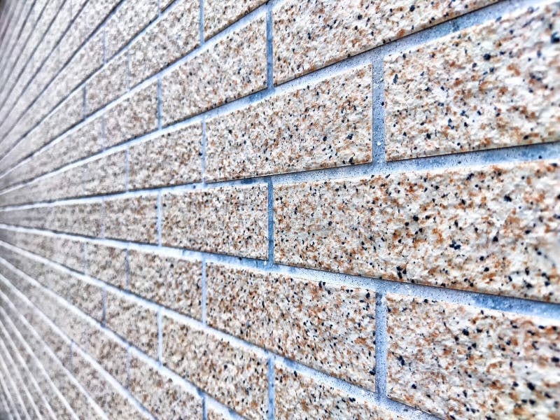 Close-up View of Textured Brick Wall with a Diagonal Perspective in ...