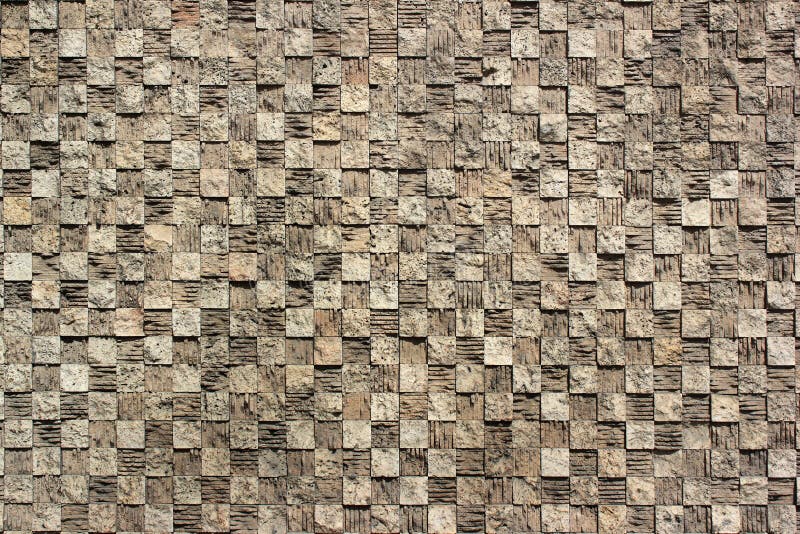 Textured Checkered Background of Relief Stone Mosaic on a Wall Stock ...