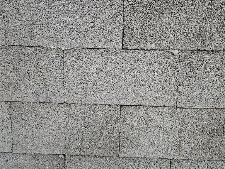 Textured Concrete Blocks Create Interesting Pattern on a Wall Under ...