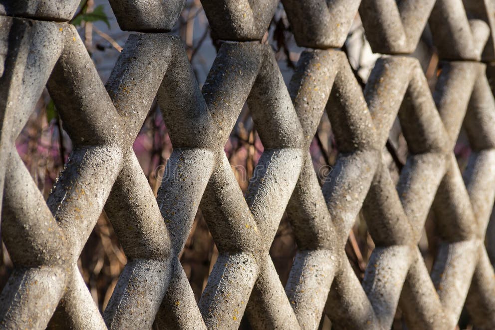 Textured Concrete Fence with Hexagonal Patterns Creating Intriguing ...