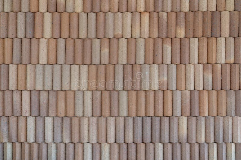 A Textured Cylindrical Brick Wall Arranged in a Horizontal Pattern ...