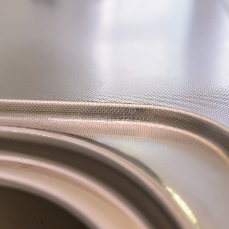 Textured Stainless Steel Surface of Sink Edge with Kitchen Worktop ...