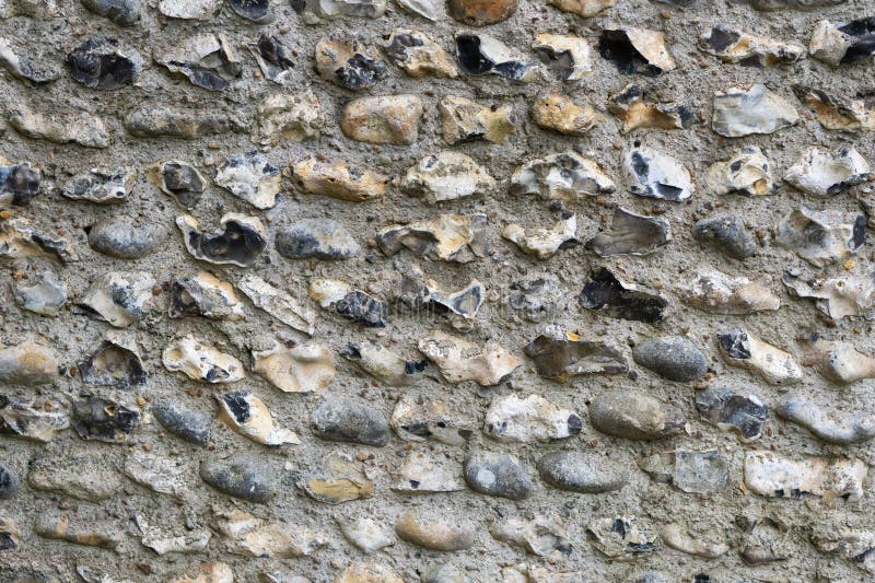 Textured Flint Stone Wall Surface Close-Up Stock Photo - Image of ...