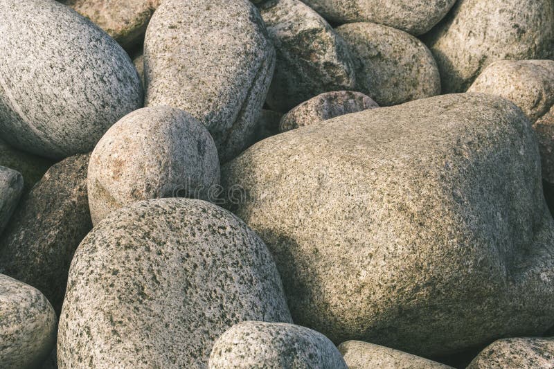 Textured Granite Boulders in Natural Light for Serene Landscaping ...