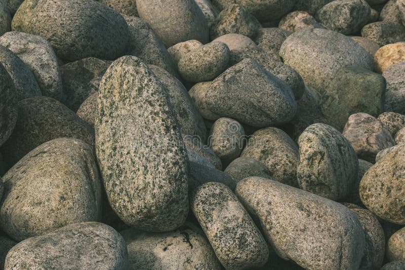 Textured Granite Boulders Piled in Natural Setting at Dusk. Stock Photo ...