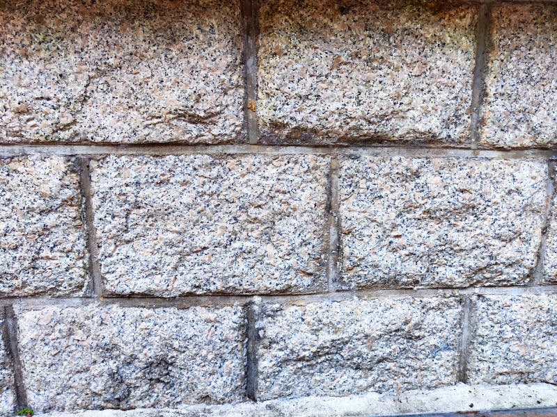Textured Granite Wall with Rectangular Stones in Natural Light Stock ...