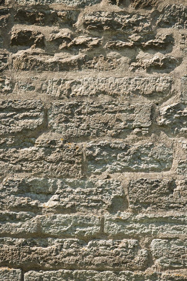 Wall of rough stone blocks stock photo. Image of texture - 26222276