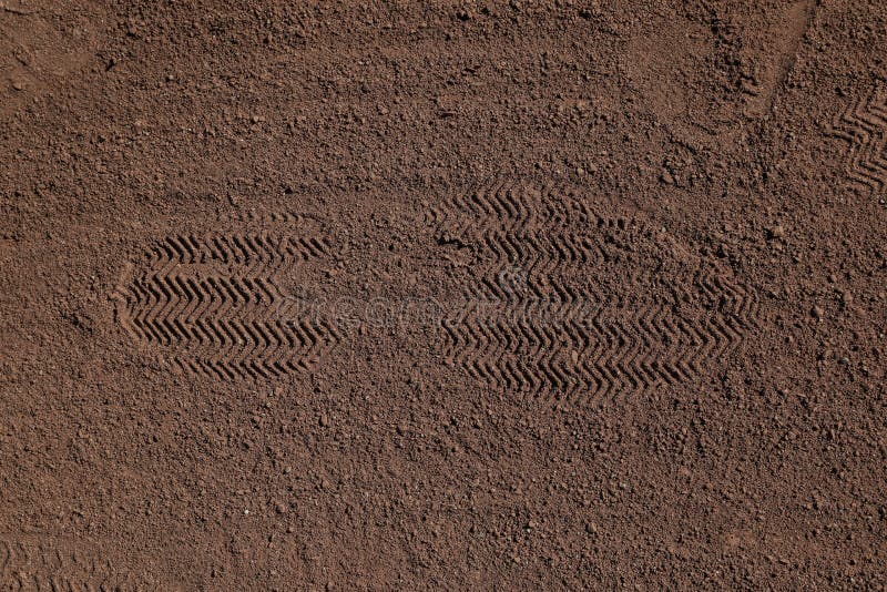 Textured Ground Surface with Footprint Stock Image - Image of brown ...
