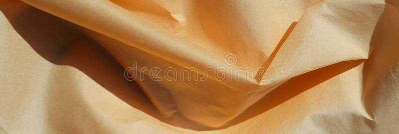 Textured Light Tan Packing Paper with a Smooth Surface and Subtle Sheen ...