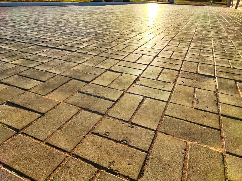 Textured Paving Stones Creating a Seamless Pattern Under the Warm ...