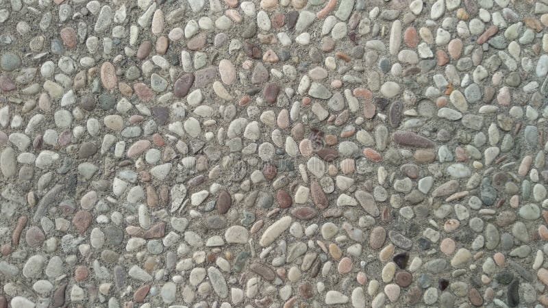 Textured pebble pavement stock photo. Image of rough - 23350168