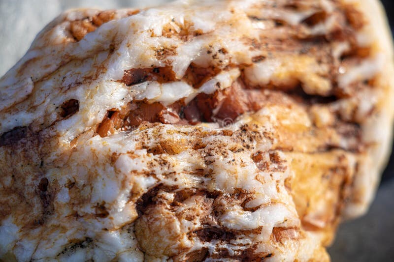 Textured Quartz Stone with Orange Iron Inclusions on Macro Stock Photo ...