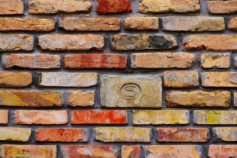 Textured Yellow and Red Bricks in Exterior Wall. Brick Pattern Closeup ...