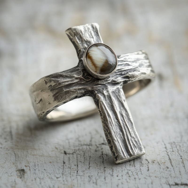 Textured Silver Cross Ring with Center Stone on Rustic Surface Stock ...