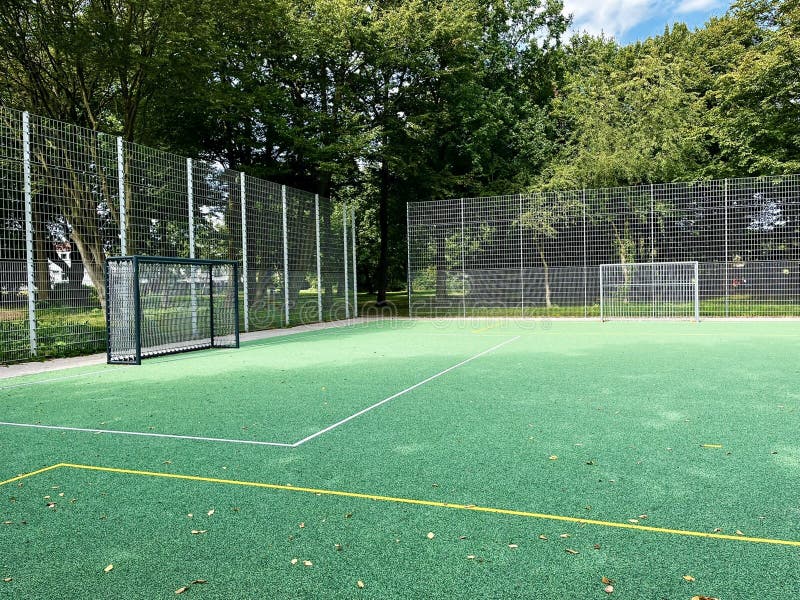 Textured Soccer Game Field - View of the Soccer Goal from Midfield ...