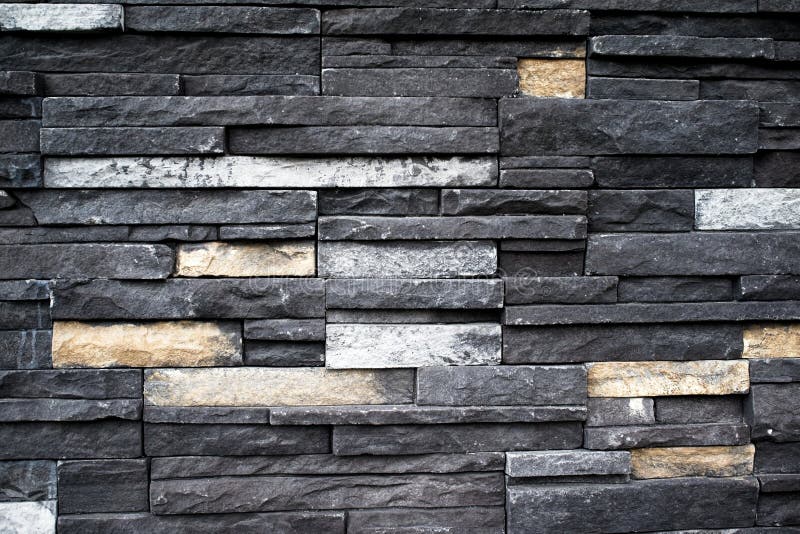 Textured Stacked Stone Wall Design Stock Image - Image of architectural ...