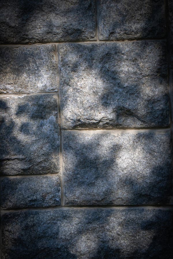 Textured Stone Wall Illuminated by Soft Shadows during Daylight Hours Stock Image - Image of ...