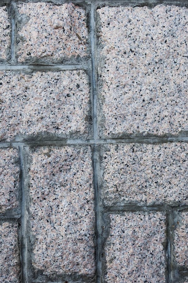 A Textured Stone Wall Made of Large Granite Blocks. Stock Photo - Image ...
