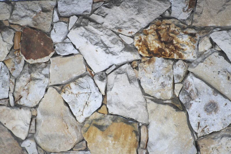 Textured Stone Wall Made of Limestone Cladding Stock Photo - Image of ...