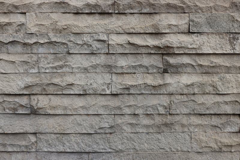 Textured Stone Wall with Rough, Uneven Surfaces and a Natural Gray Tone ...