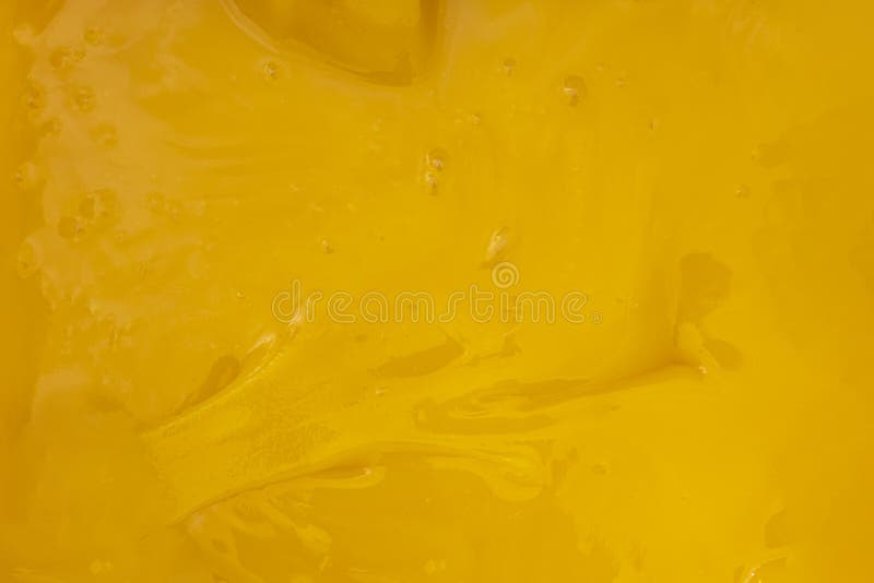 Yellow Texture from Thick Mass of Liquid Bee Honey. Stock Photo - Image ...
