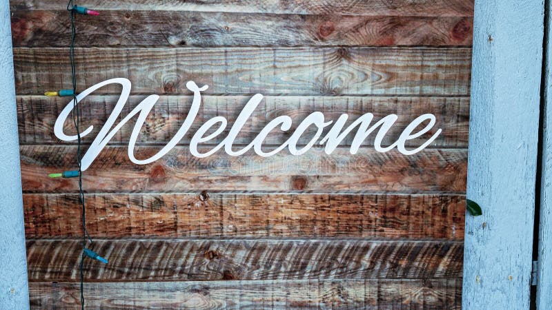 A Textured Timber Welcome Sign Stock Photo - Image of house, arrival ...