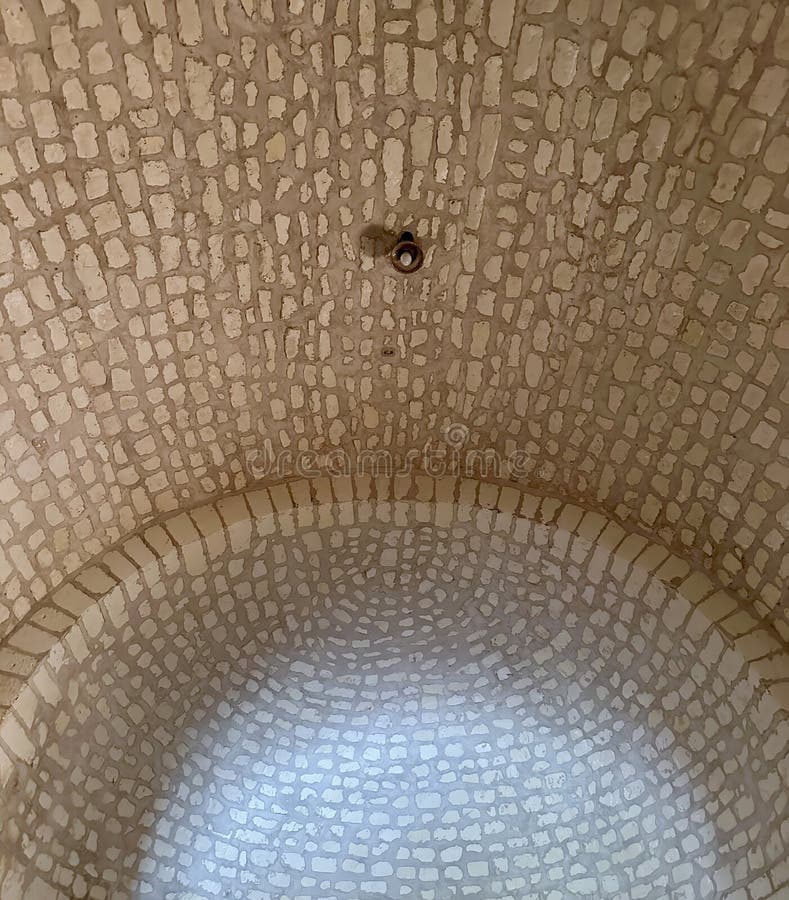 Textured Vaulted Brick Ceiling with Intricate Stone Patterns and Single ...
