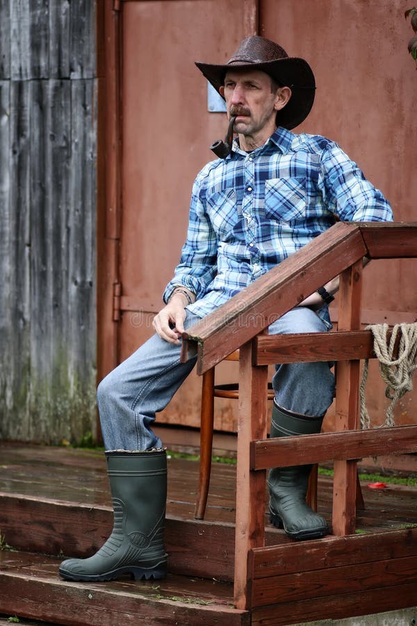 Cowboy man smoke pipe stock photo. Image of adult, caucasian - 100345628
