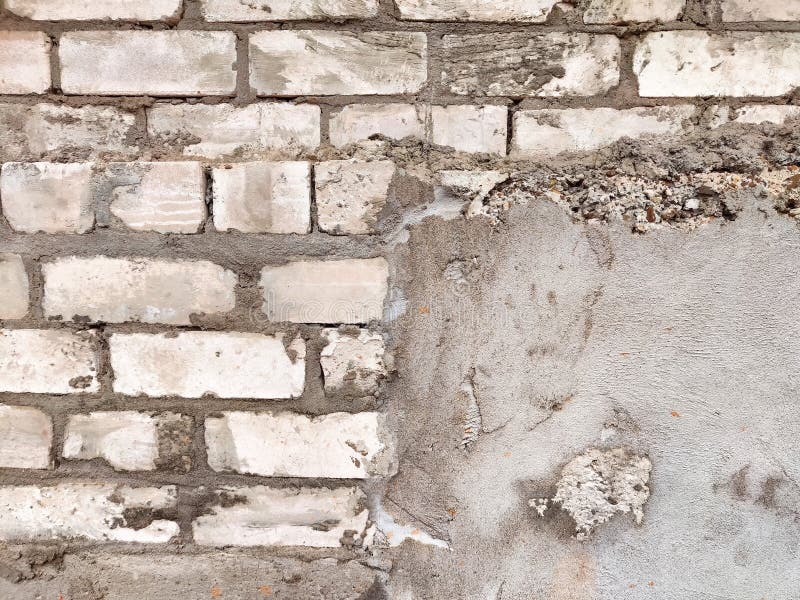 Textured Wall Featuring Bricks and Plaster for Design and Artistic Use ...