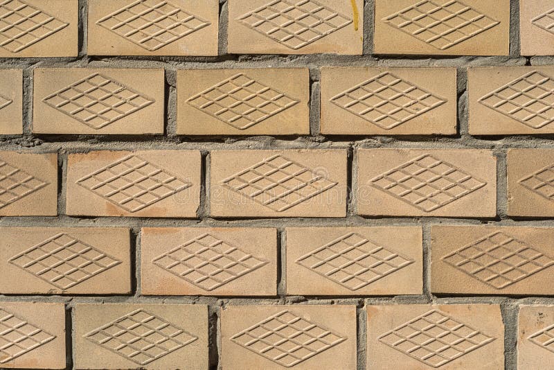 The Textured Wall is Lined with Old Soviet Beige Ceramic Tiles Stock ...