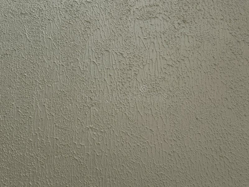A Textured Wall Surface Featuring a Subtle Greenish Hue Stock Image ...
