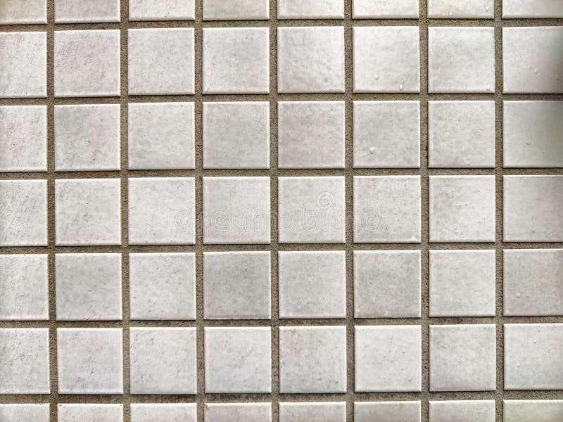 Textured White Tiles Arranged in a Neat Grid, Perfect for Creating a ... Textured White Tiles Arranged in a Neat Grid, Perfect for Creating a ...