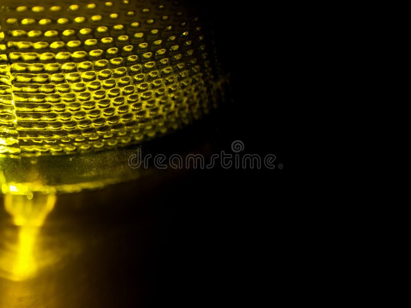 A Textured Yellow Surface Glows Against a Dark Background. Stock Image ...
