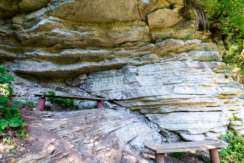 Textures of Various Stone Layers on Cliff. Benches in Rest Place on ...