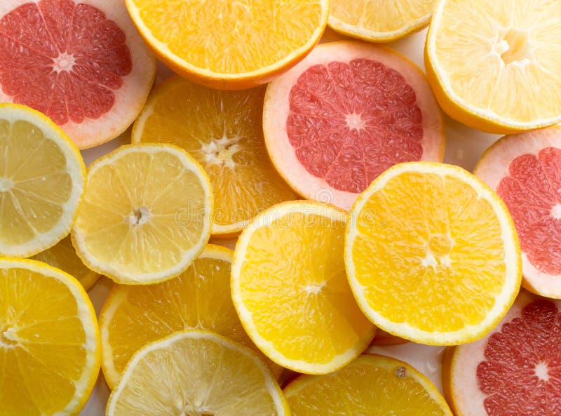 Textuur Van Gesneden Citroen, Oranje En Rode Grapefruit Stock ...