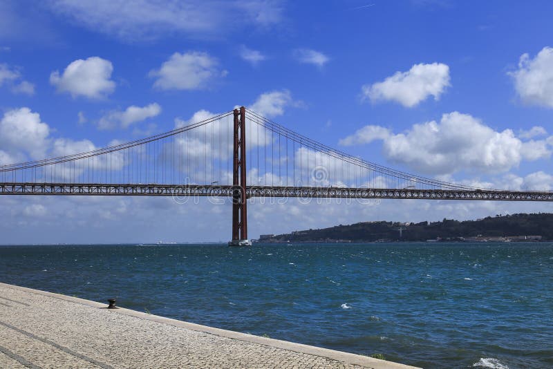 25th April Bridge in Lisbon on a Sunny Day Stock Photo - Image of river ...