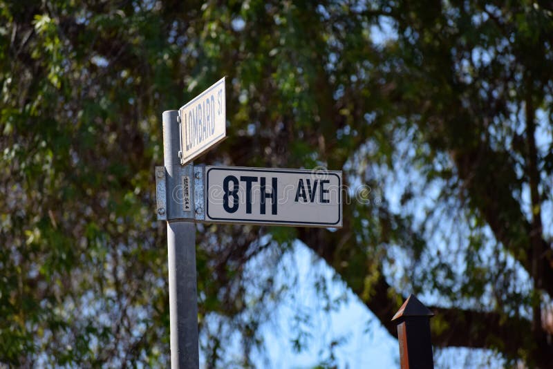 8th Ave Street Name Sign stock photo. Image of symbol - 188569898