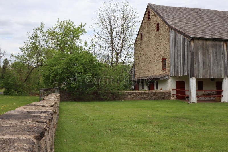 The Farm Has an Old Stone Wall Near the Barn. Stock Image - Image of ...