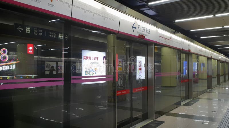 19th of May, 2018: Subway Platform Gate and Direction Signs at Beijing ...