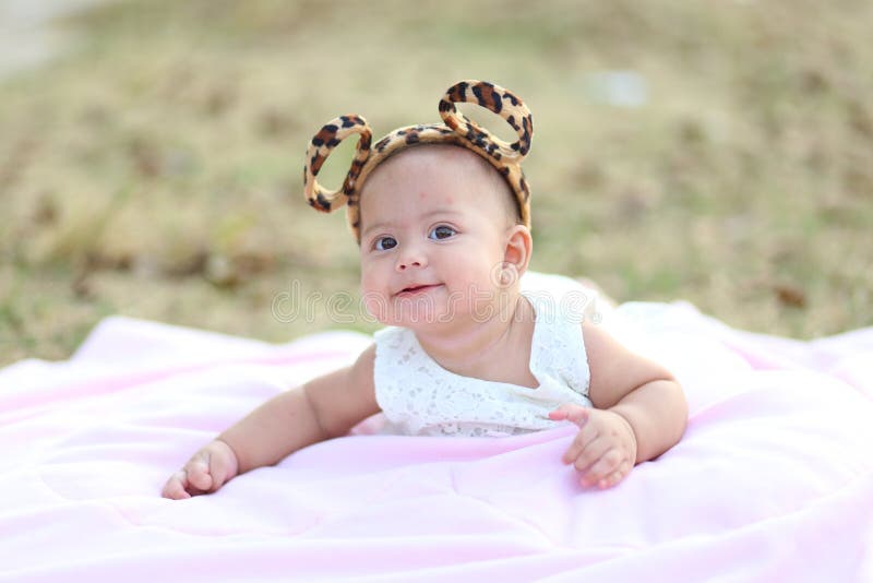 Thai Baby Smiling in the Evening the Playing Field. Stock Image - Image ...