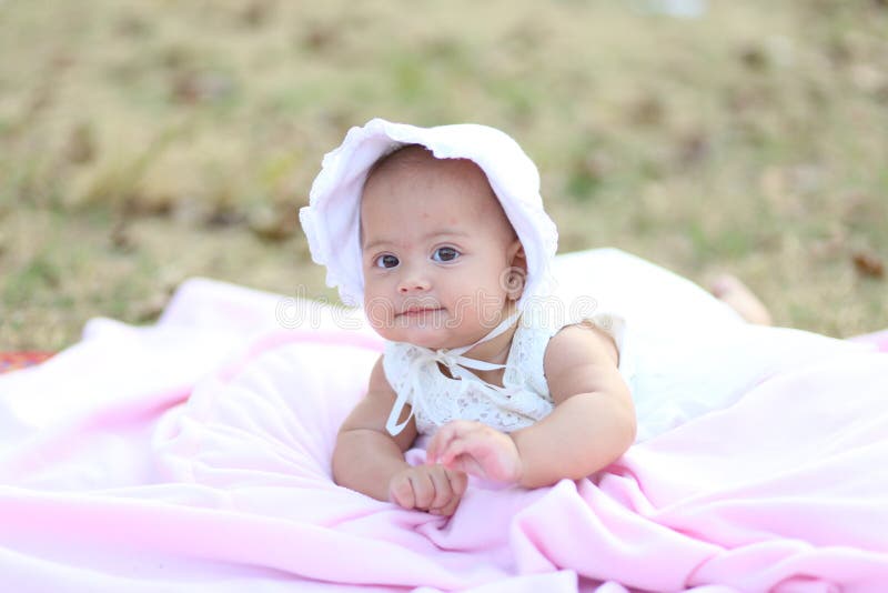 Thai Baby Smiling in the Evening the Playing Field. Stock Photo - Image ...